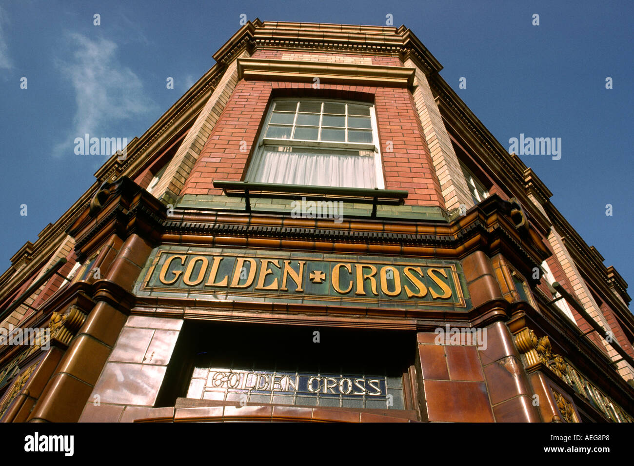 Wales Cardiff Golden Cross Pub tiled sign over doorway Stock Photo - Alamy