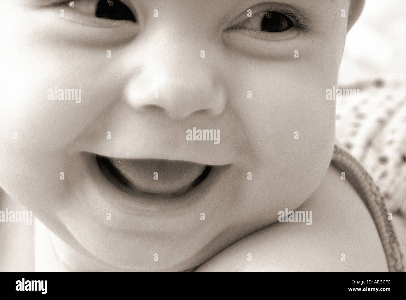 Baby close up brown eyes cute rosy cheeks staring curiosity Stock Photo ...