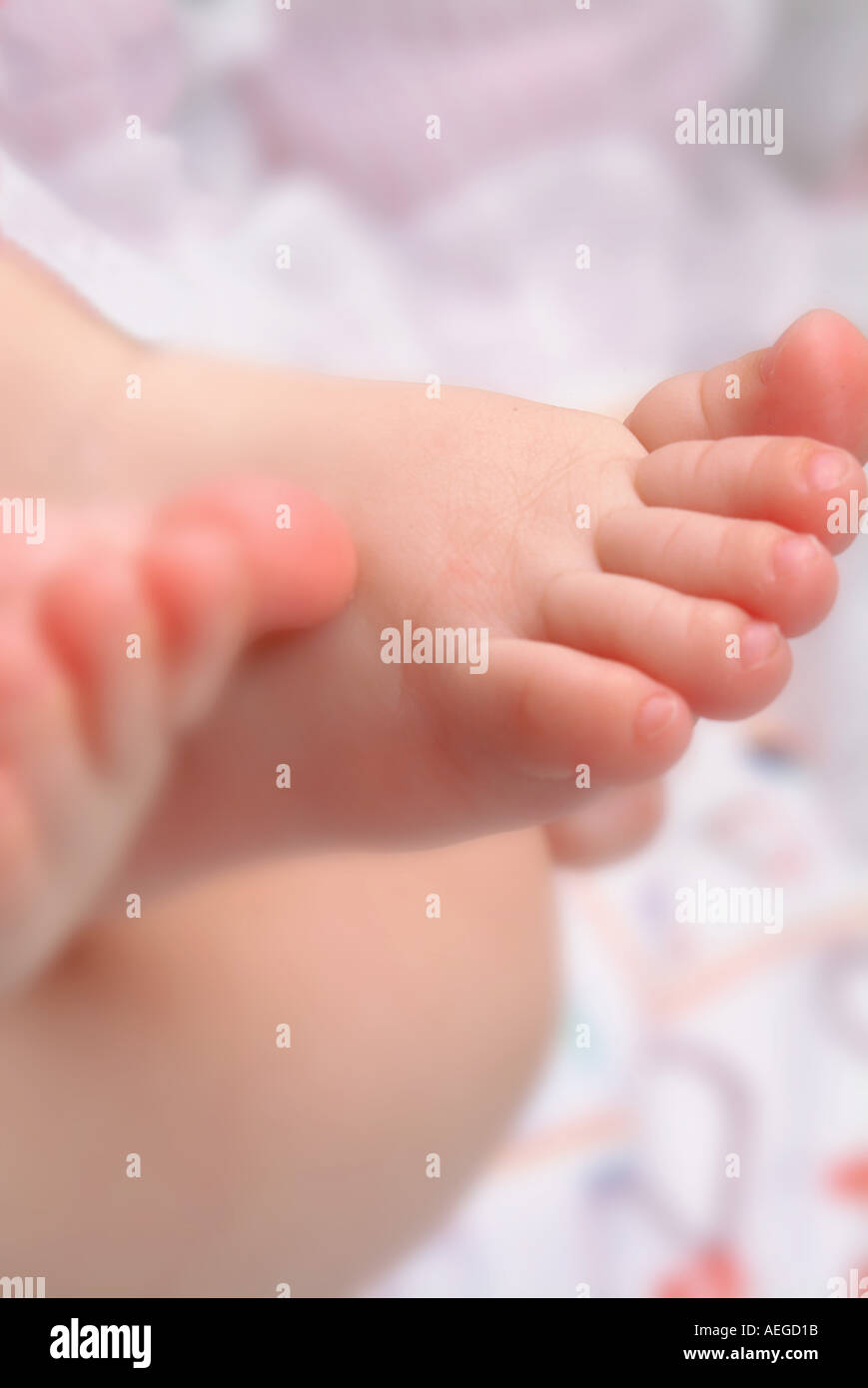 Baby foot detail closeup close up close up cute rosy cheeks staring ...