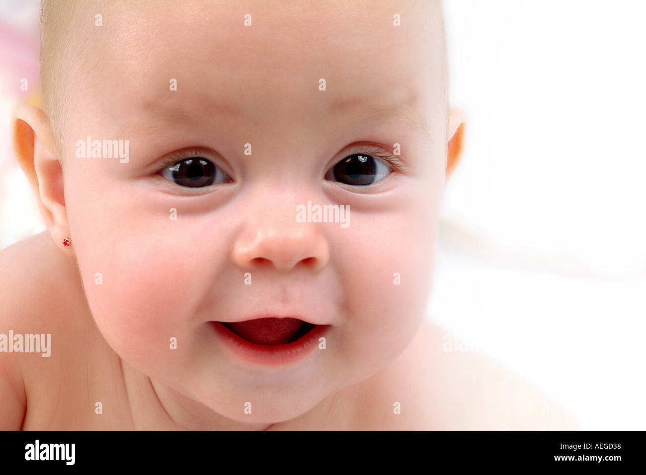 Baby chubby cute staring cheeky hi-res stock photography and images - Alamy