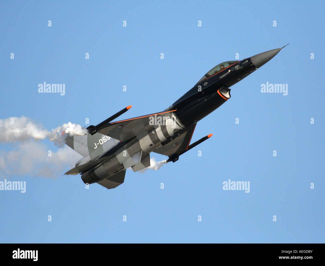 Royal Netherlands Air Force F-16 jet fighter flying nose up during an ...