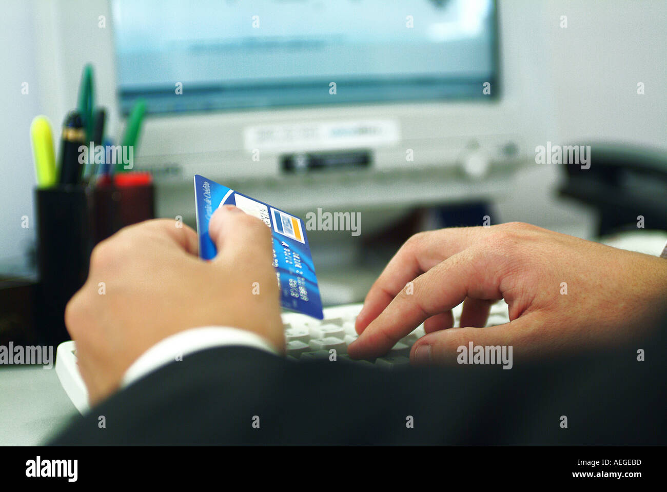 Businessman office keyboard screen monitor typing phone desk desktop ...