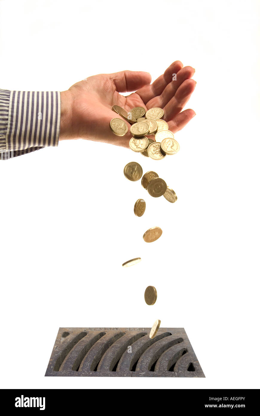 Money down drain hi-res stock photography and images - Alamy
