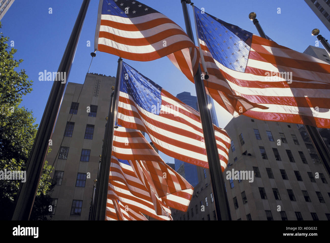 American flags in front of Rockefeller center Stock Photo - Alamy