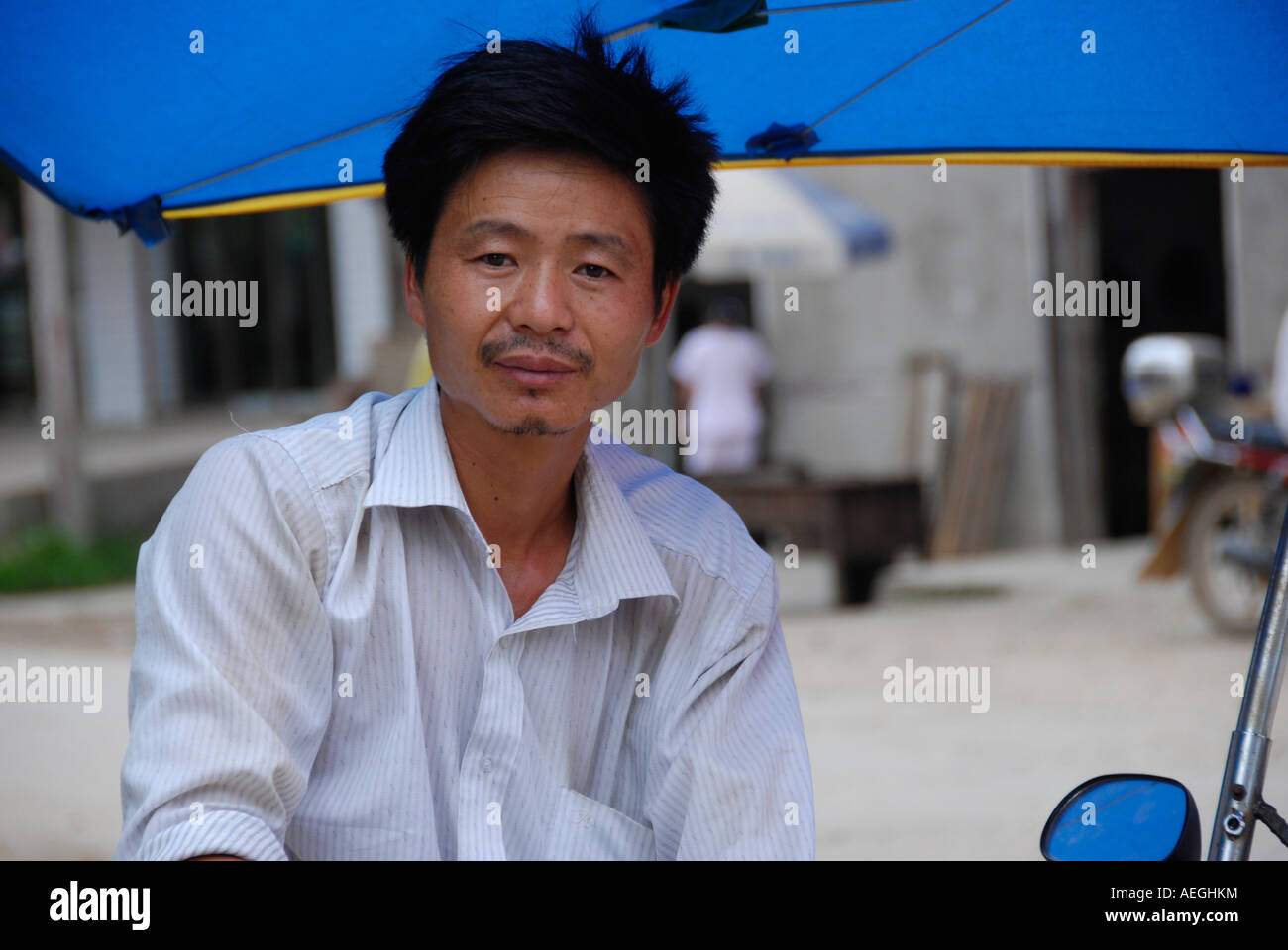 A Chinese man in a village Stock Photo - Alamy