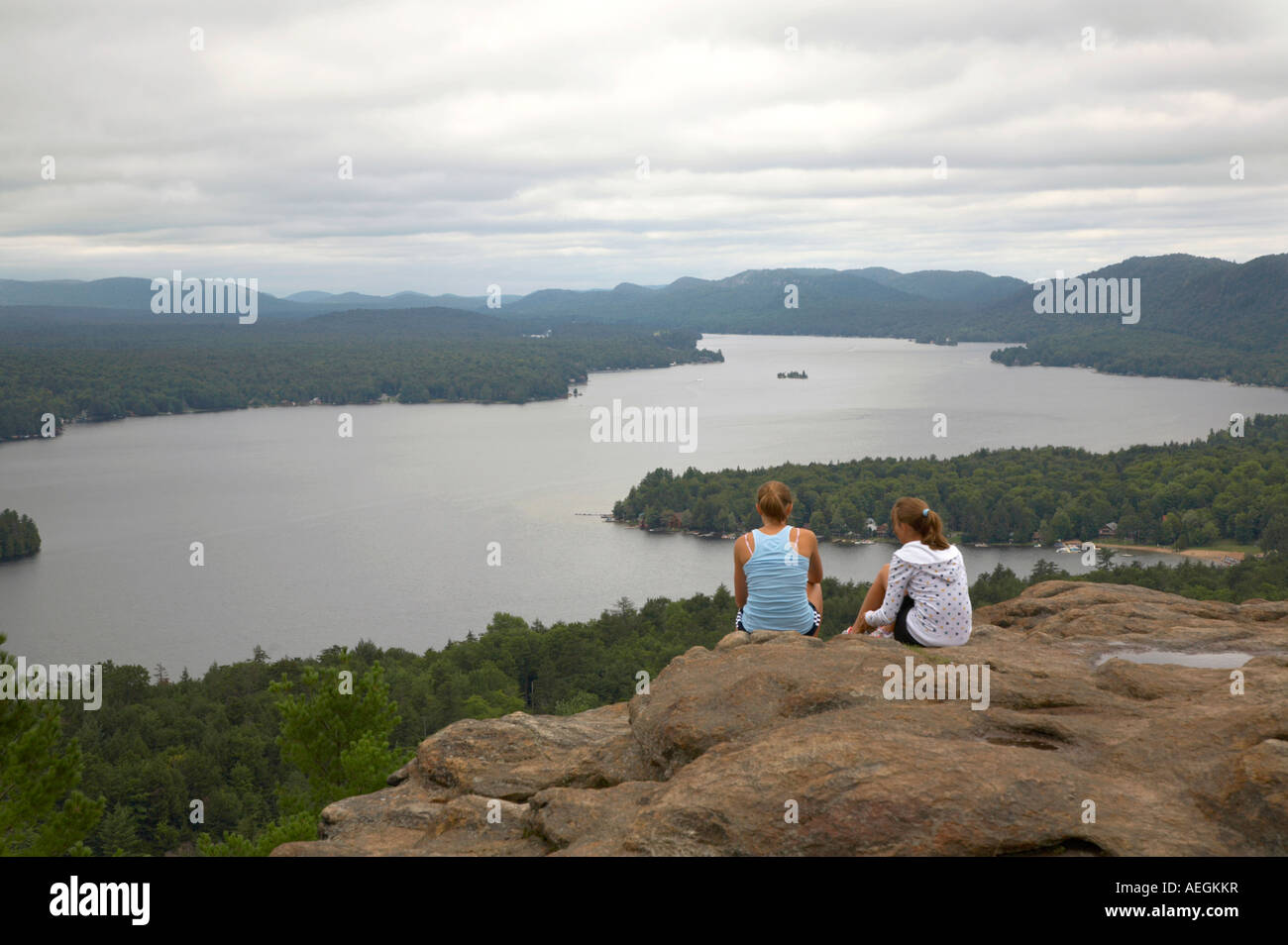 People viewing scene of Fourth Lake in the Fulton Chain Lakes from ...