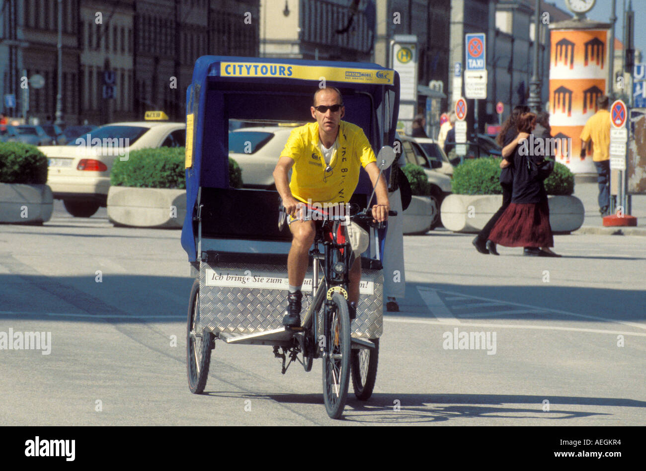 Germany Bavaria Munich a bicycle rickshaw Stock Photo - Alamy