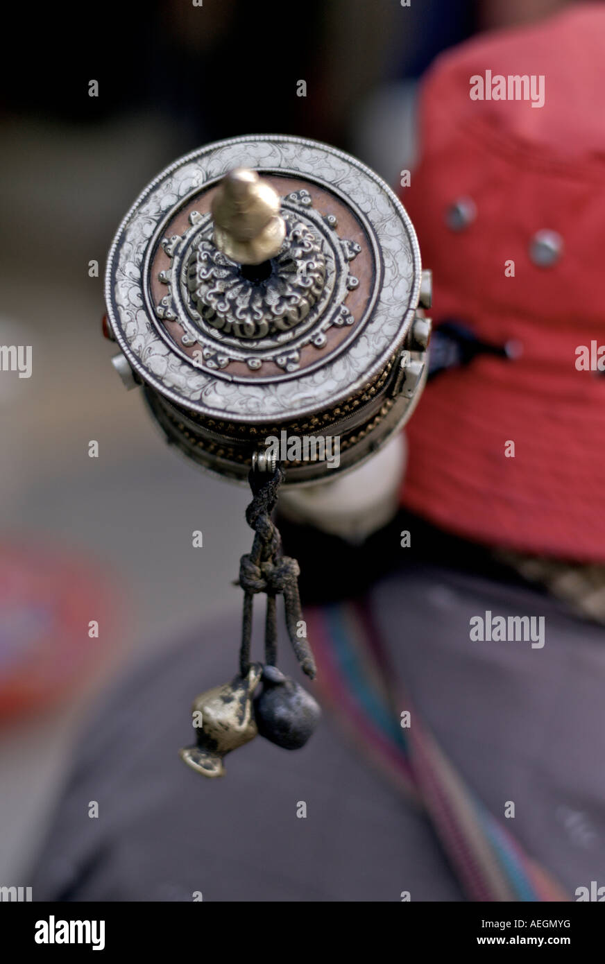 Hand held pray wheel Stock Photo - Alamy