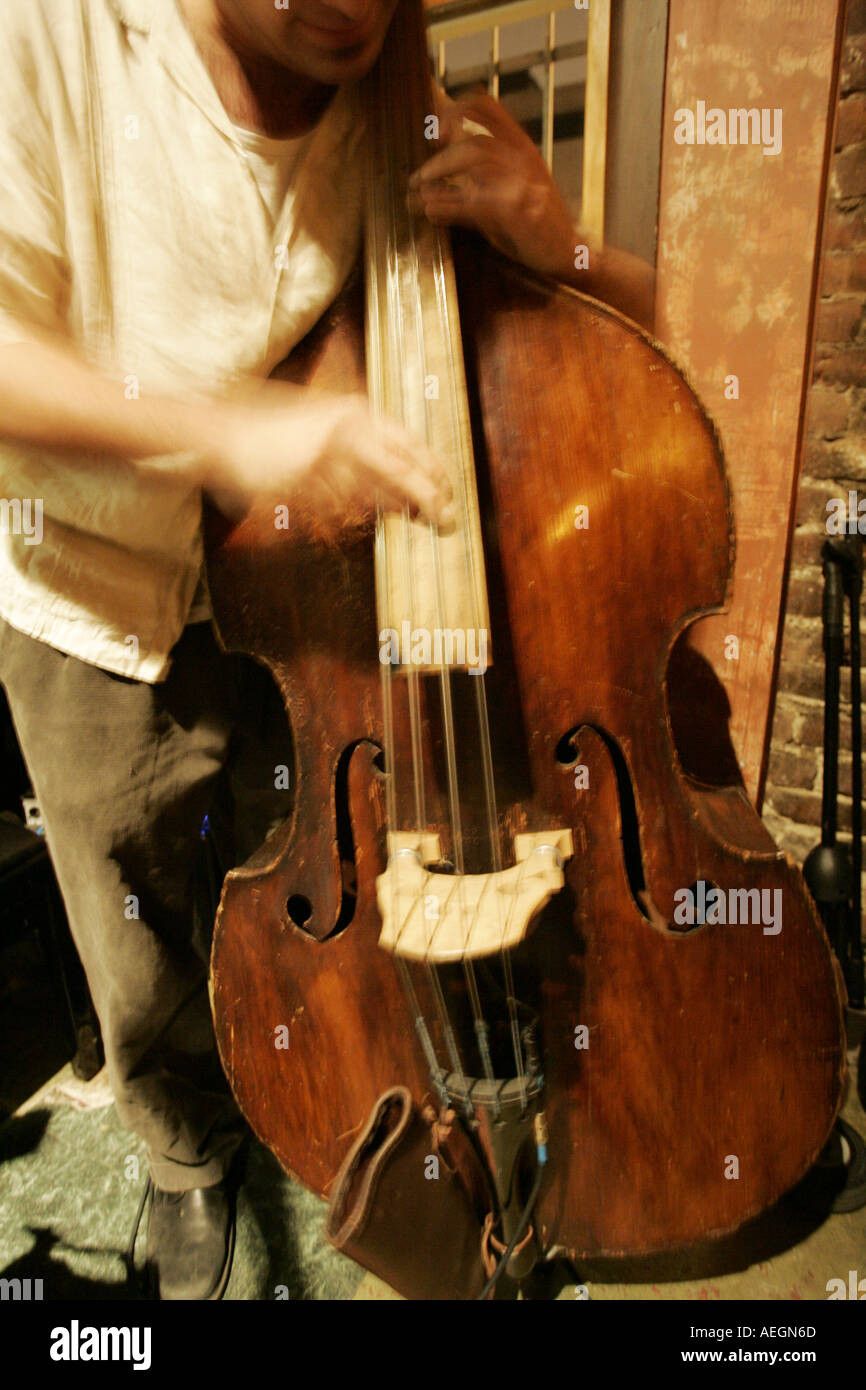 Musician playing upright bass Stock Photo - Alamy