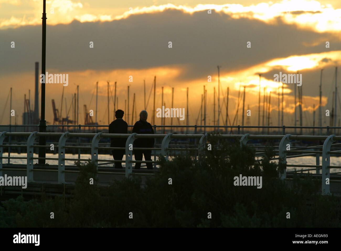 sunset at harbour Stock Photo - Alamy