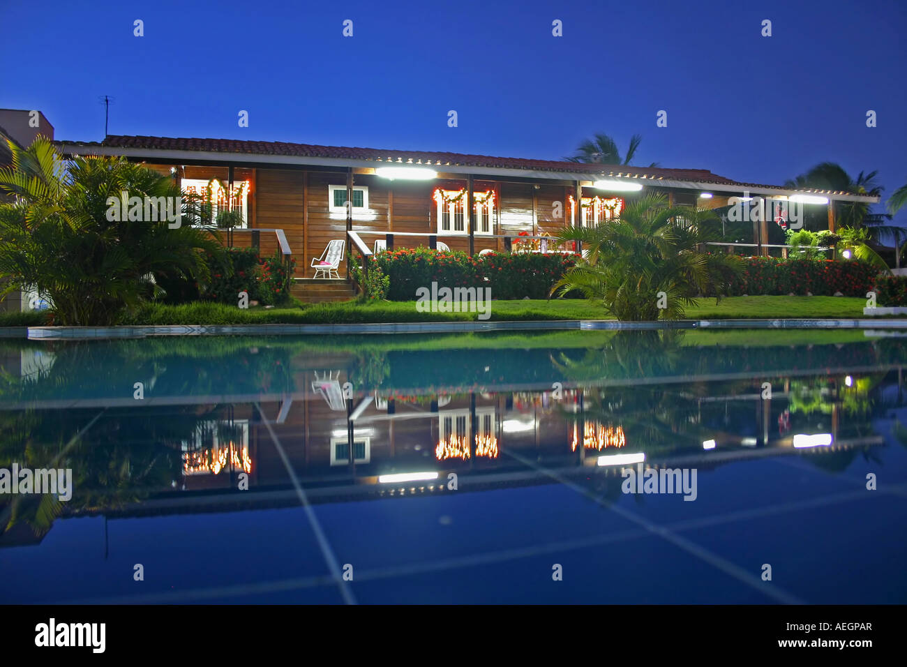 house and pool view at night Stock Photo - Alamy