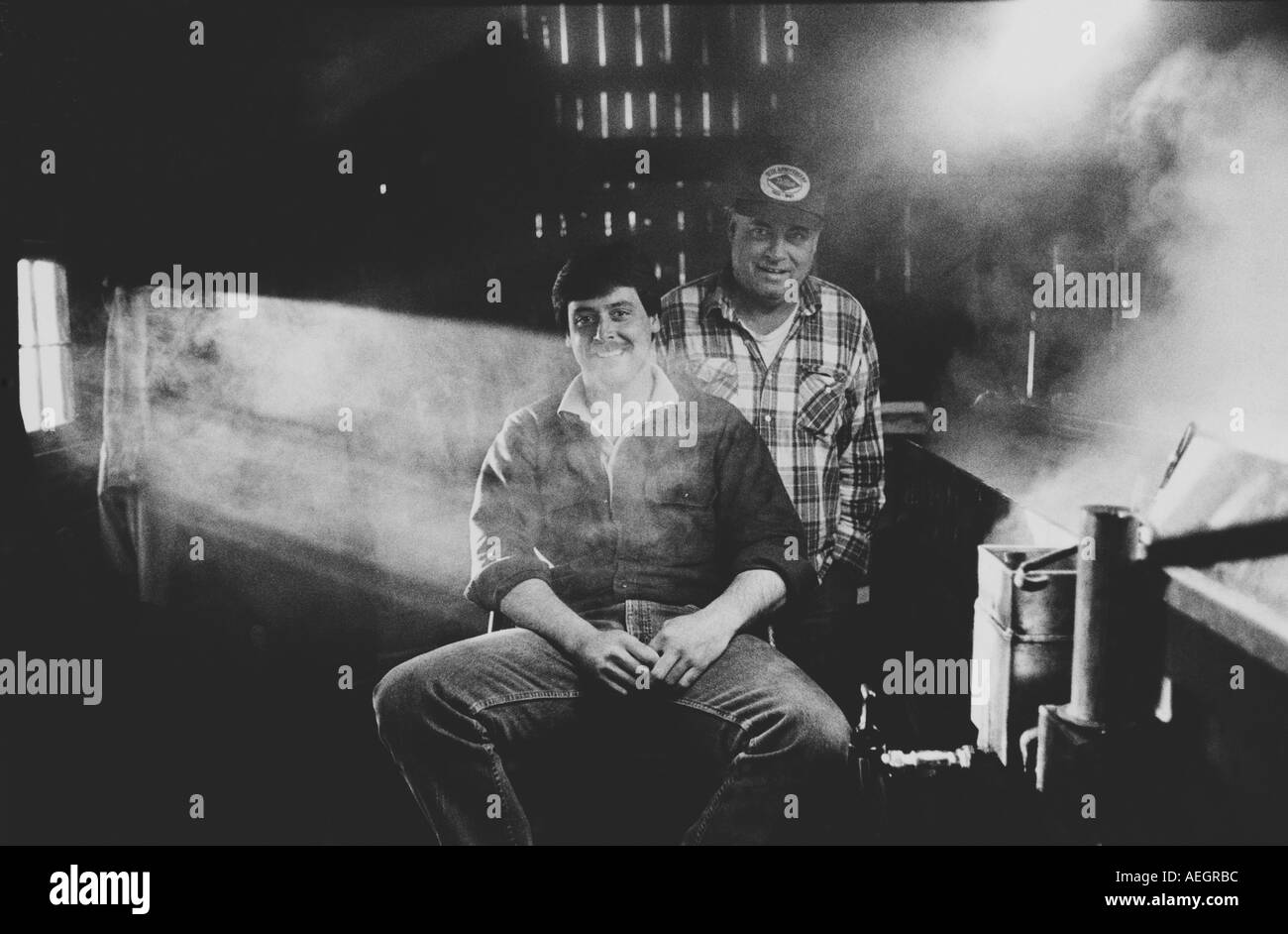 USA Vermont Hyde Park maple syrup makers father and son Stock Photo - Alamy