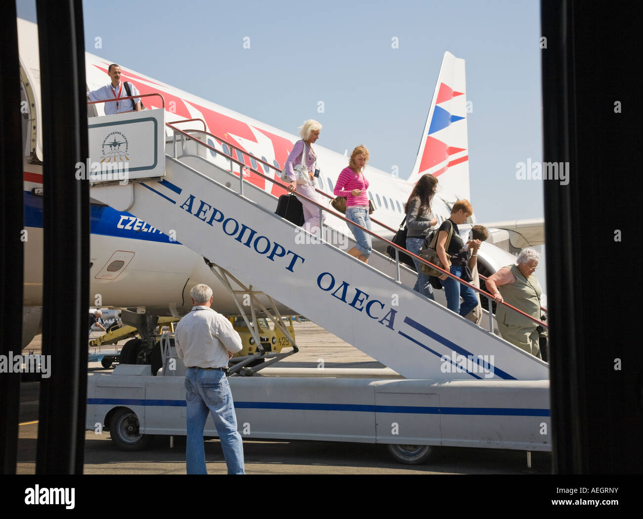 Leaving the plane hi-res stock photography and images - Alamy