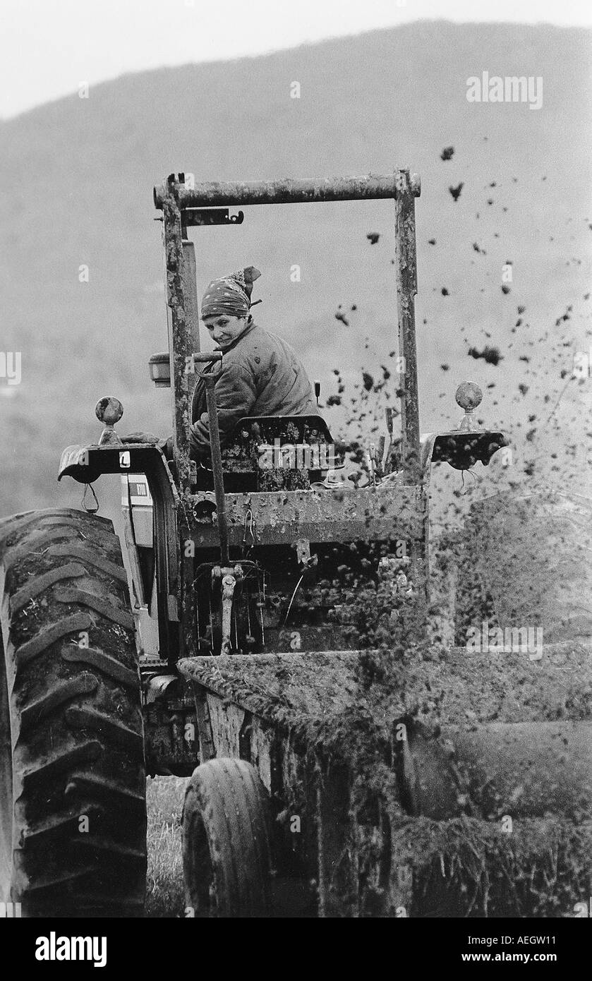 Farm woman plowing field Stock Photo - Alamy