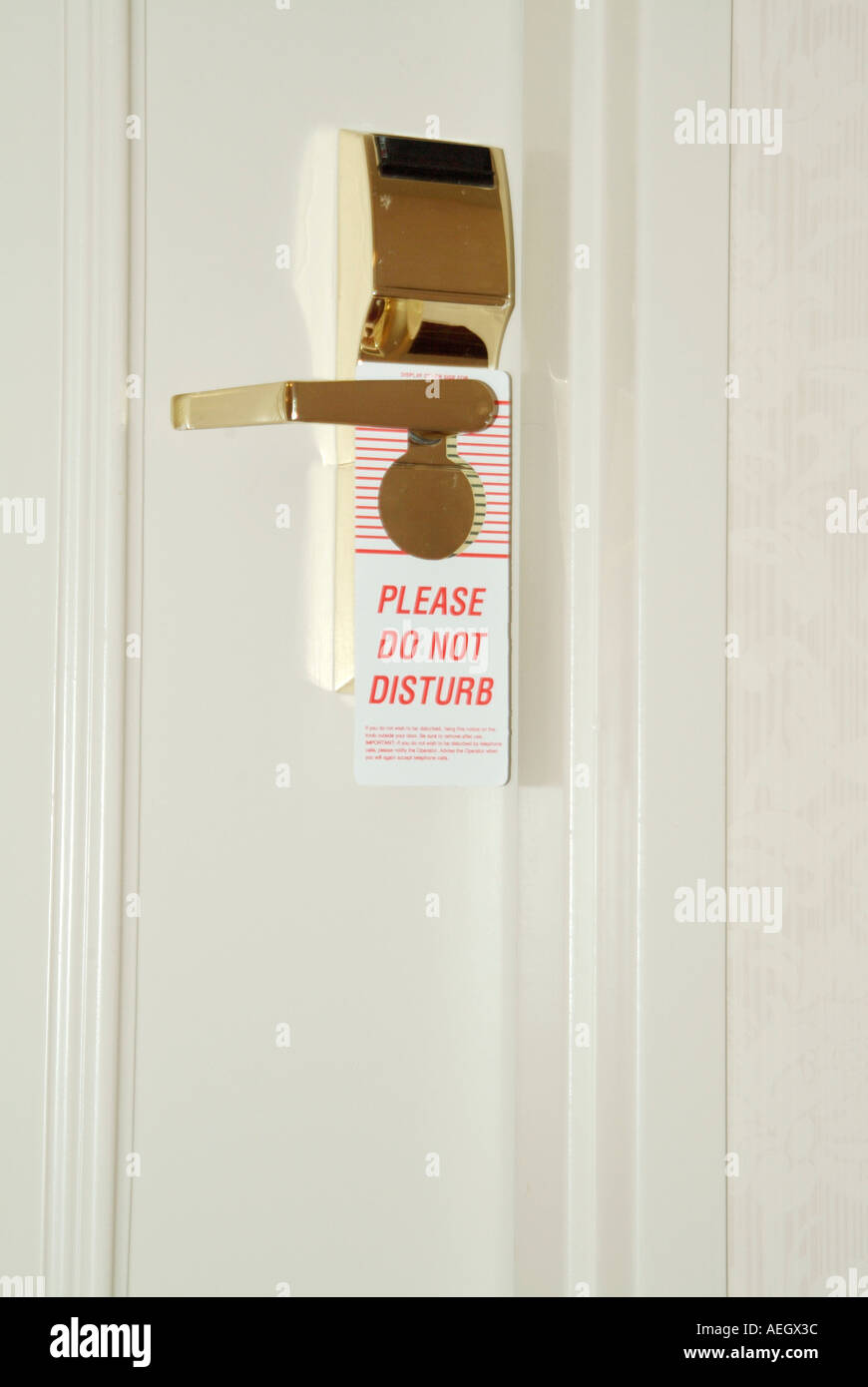 Door with Do Not Disturb sign Stock Photo - Alamy