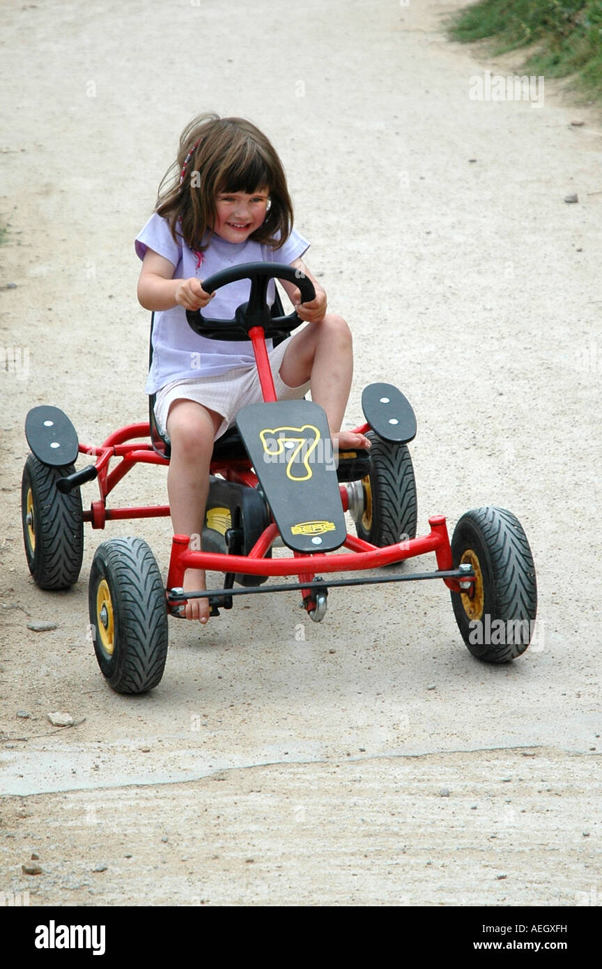 Small Girl Riding A Go-Kart Stock Photo - Alamy