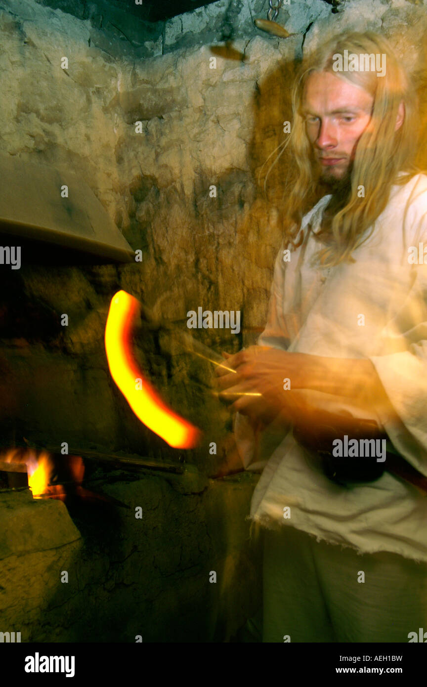 One smith blacksmith man forging hi-res stock photography and images ...