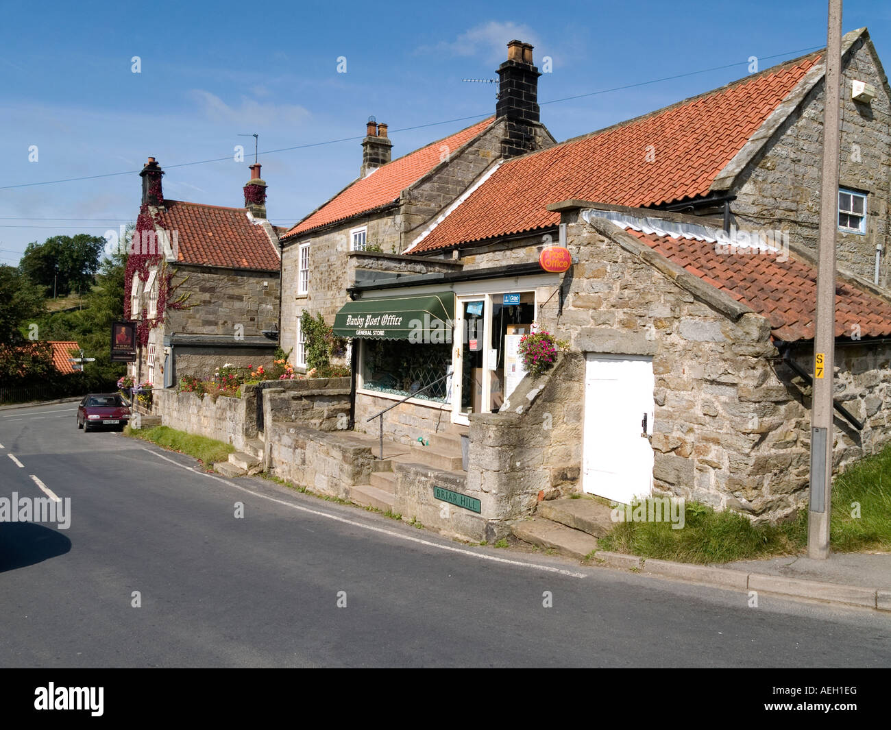 Traditional stone built village shop and post office in Danby North ...