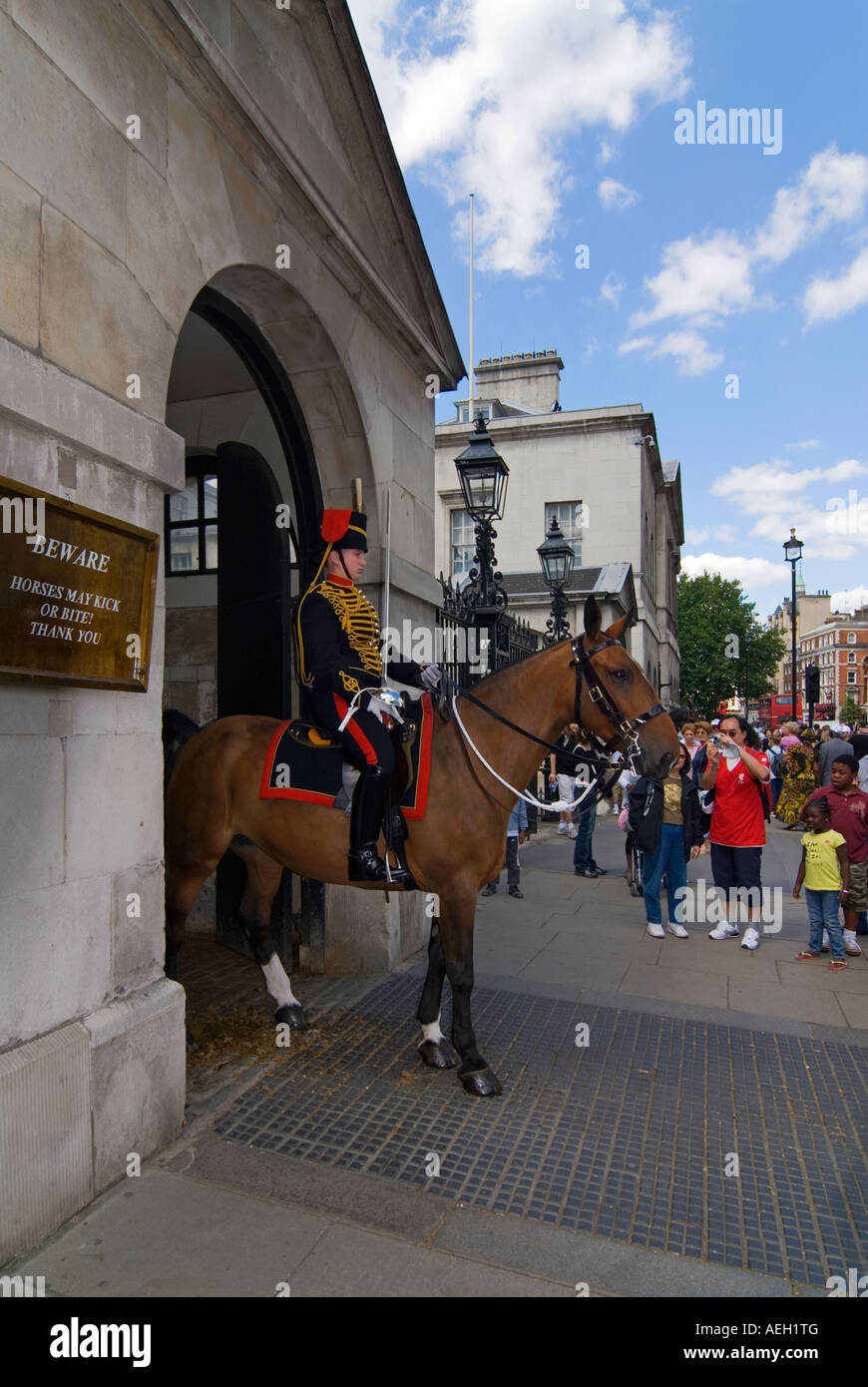 Vertical view of female member of the Household Cavalry mounted outside ...