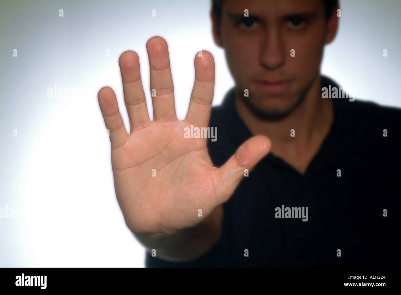 Expressions determined stopping person gesture black shirt serious ...