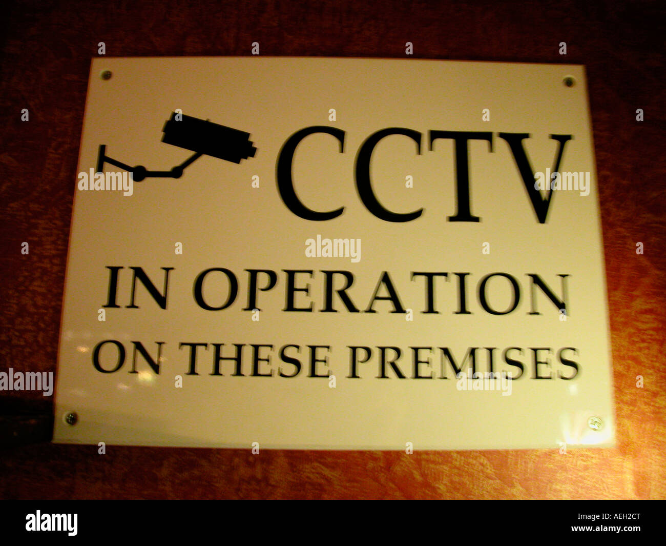 cctv warning sign on the door in a London pub Stock Photo - Alamy