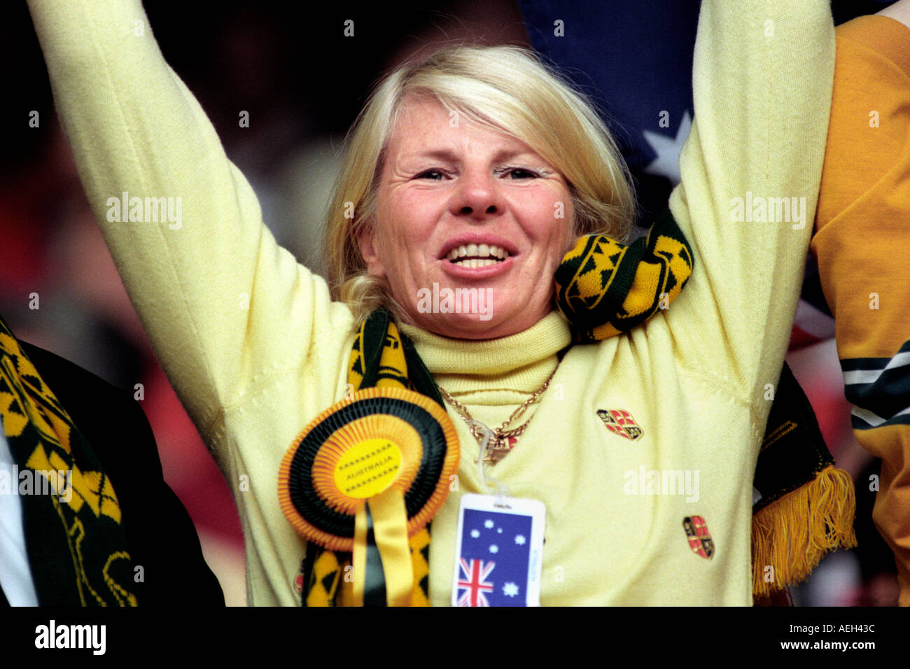 Australian rugby fan cheering her team in the Millennium Stadium ...