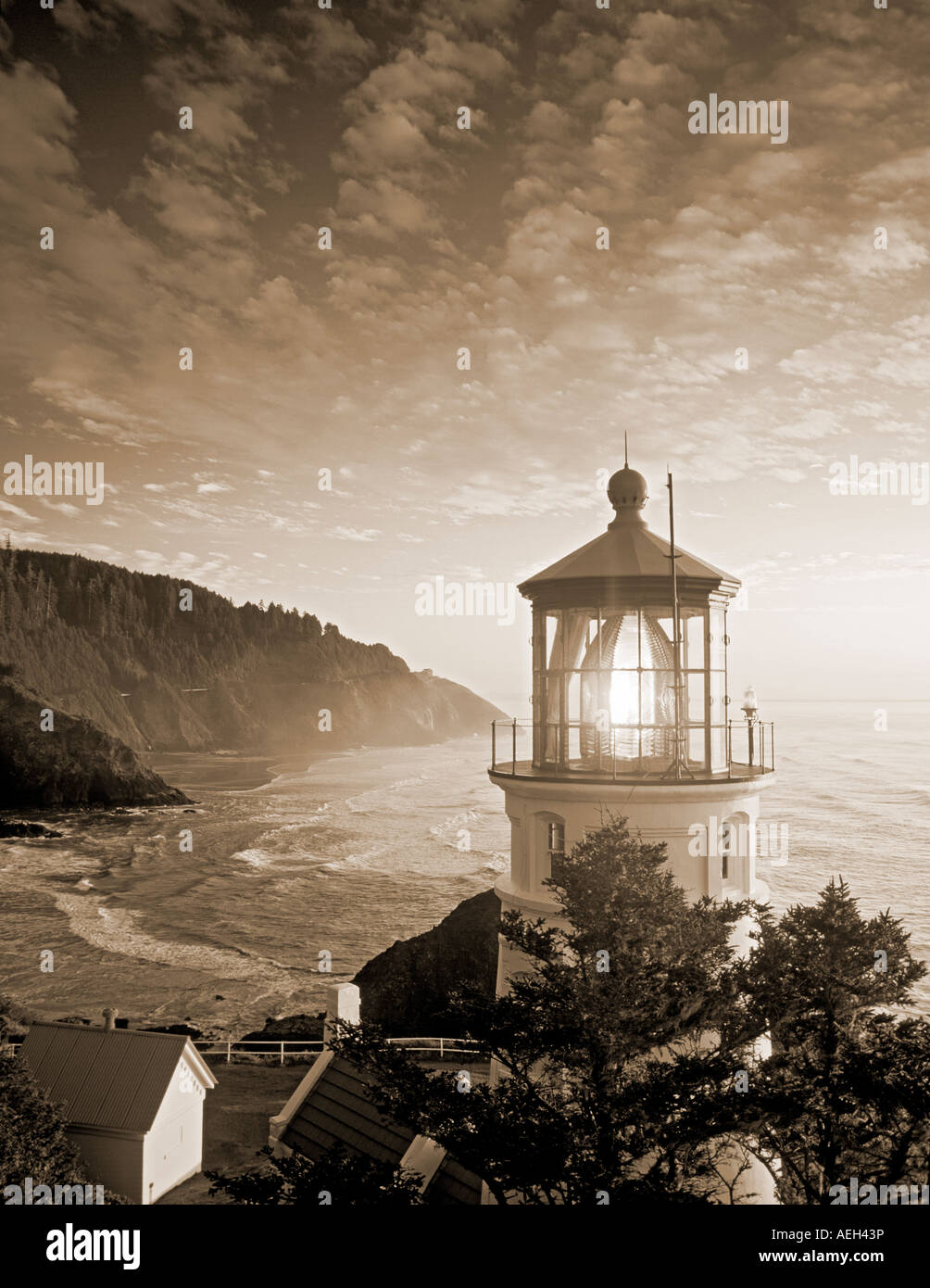 S00062M tiff Heceta Lighthouse with sunset clouds and fog Oregon Stock ...