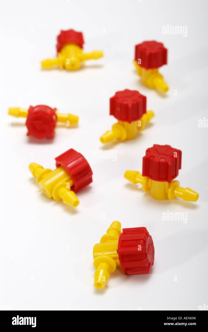 Red and yellow plastic "stop taps" for diy "self watering" system for ...