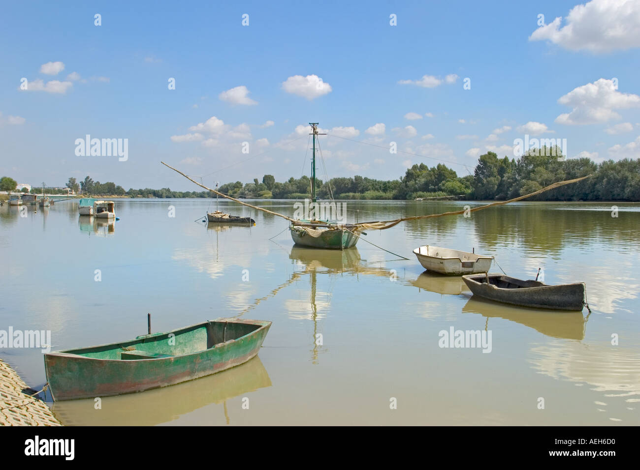 Coria del Rio Seville Province Spain Boats on Guadalquivir river Stock ...