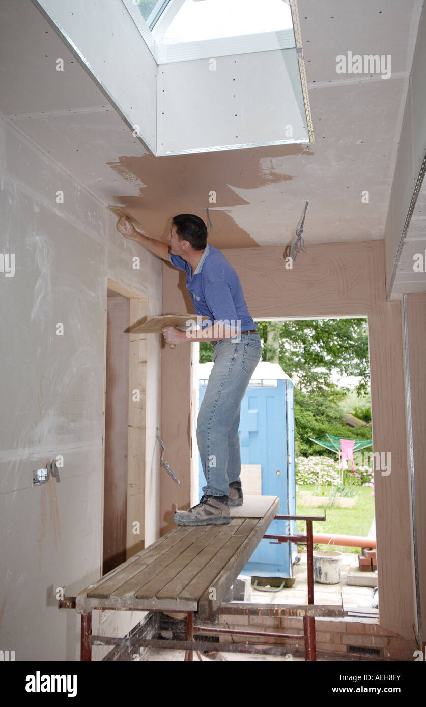 Plastering a ceiling Stock Photo - Alamy