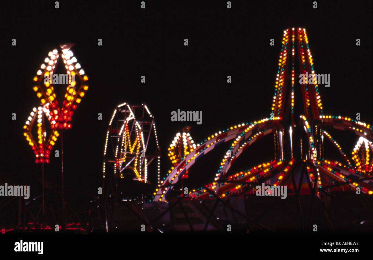 Fun fair lights at night Stock Photo - Alamy