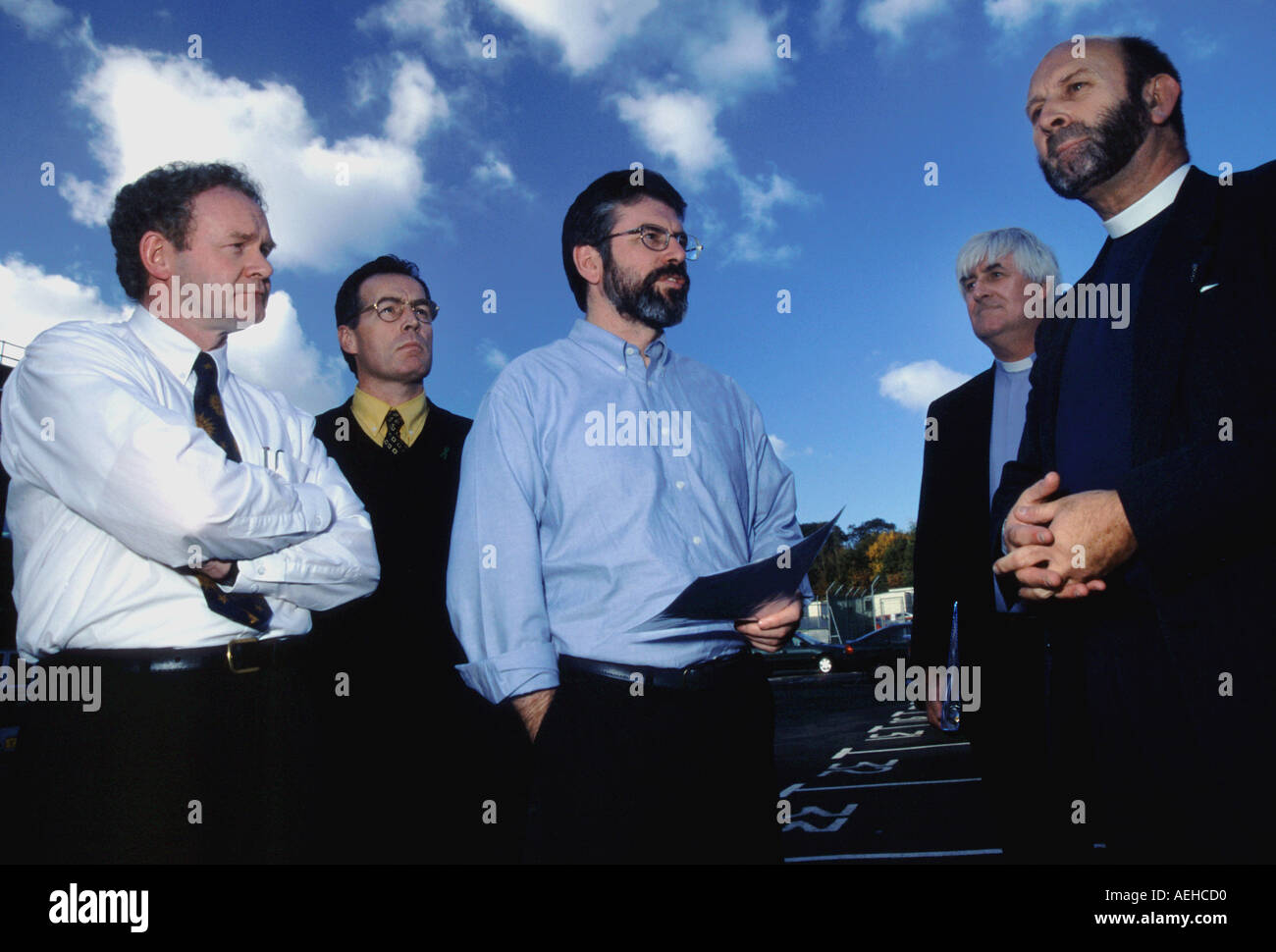 Garry Adams, Martin mc guinness, talking the priest Stock Photo - Alamy