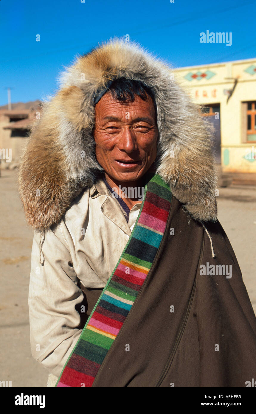 Tibetan Nomad with fur-lined hood, Amchog Gonpa monastery on the Sangke ...