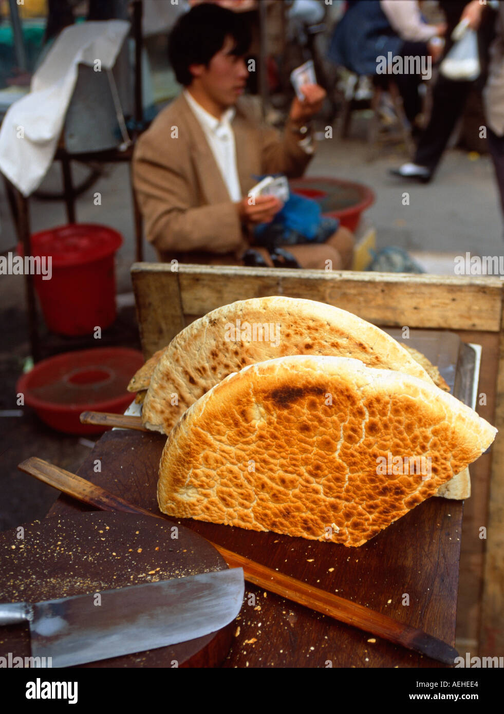 Large bread for sale at street market in the backstreets of the Old ...