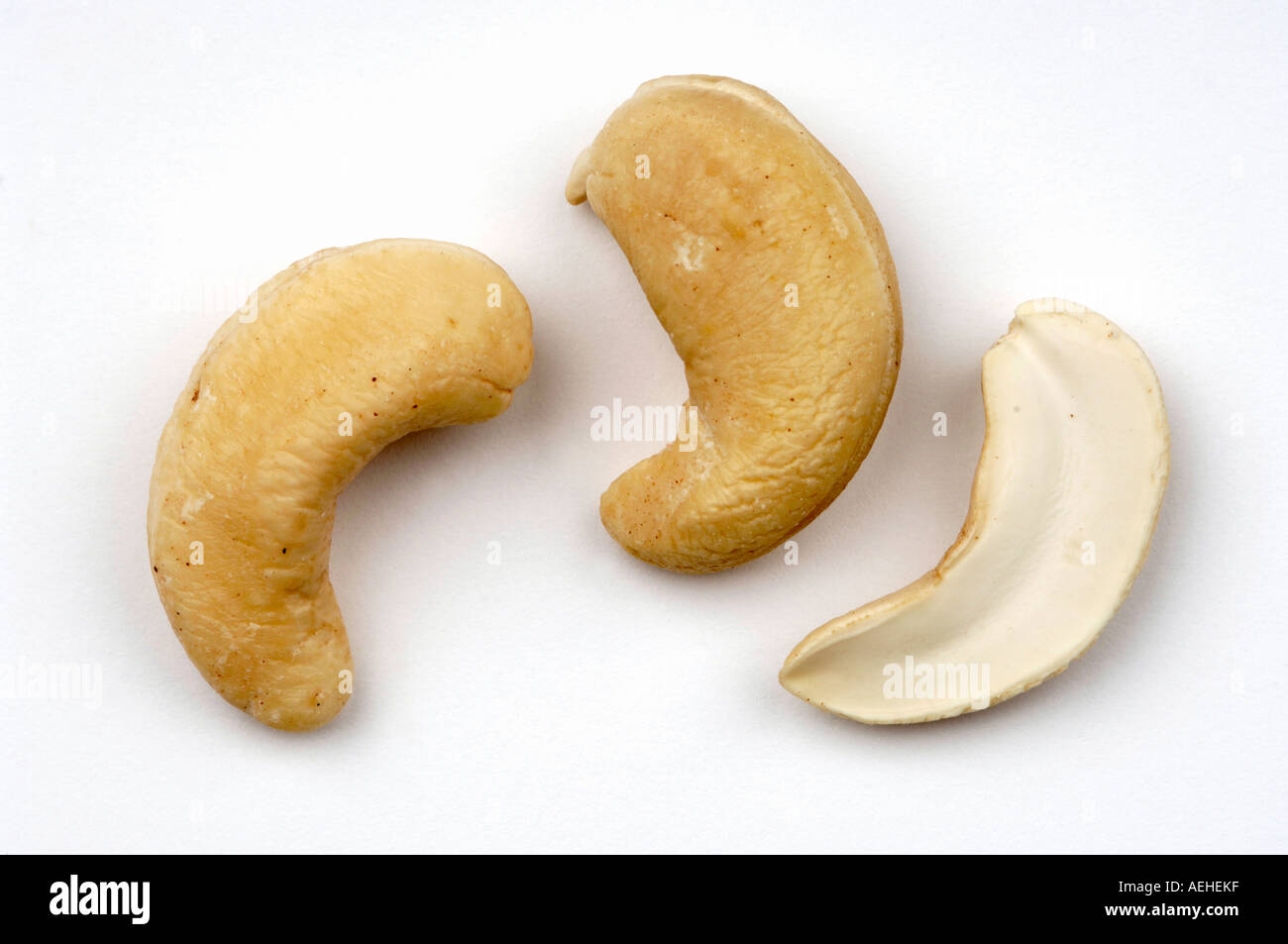 Three cashew nuts Stock Photo - Alamy