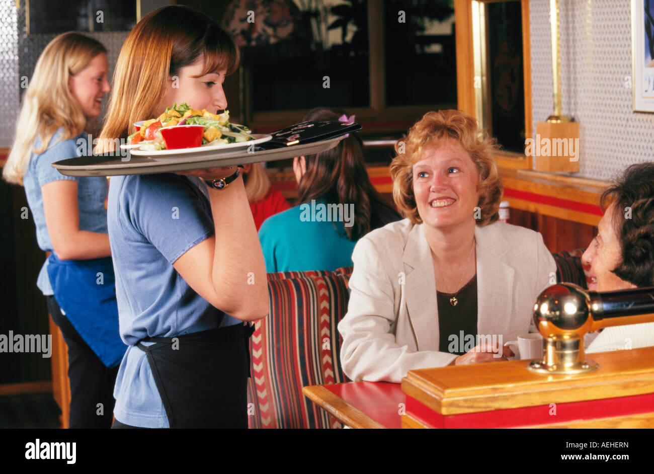 Diner waitress rear view hi-res stock photography and images - Alamy