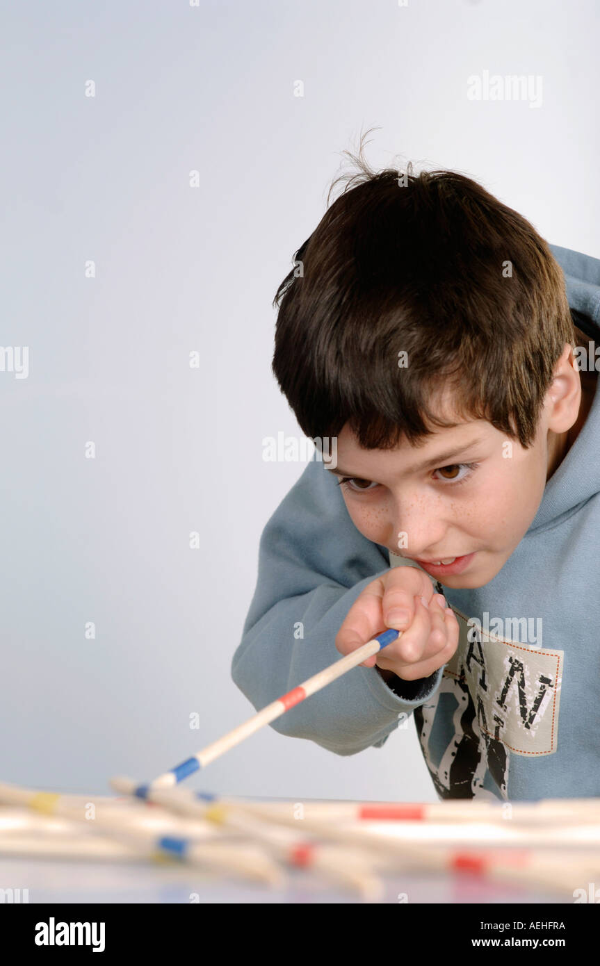 Children pick up sticks hi-res stock photography and images - Alamy