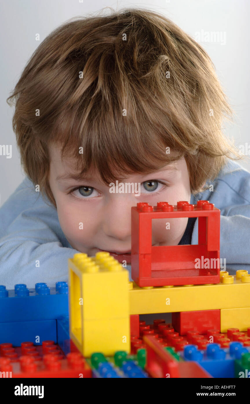 Boy playing with LEGO bricks Stock Photo - Alamy