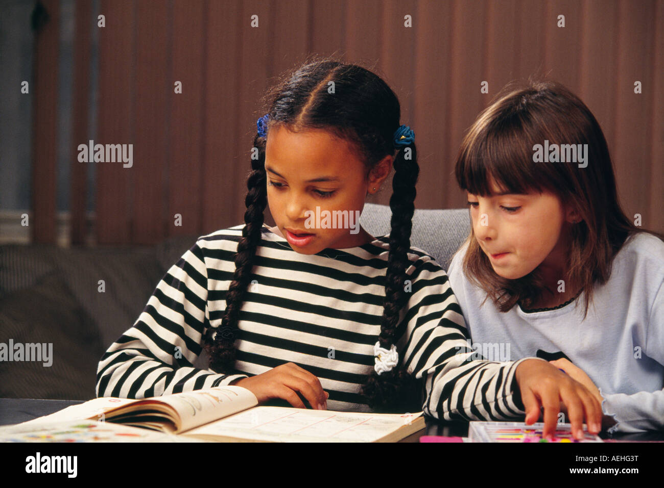 Two girls studying together Stock Photo - Alamy