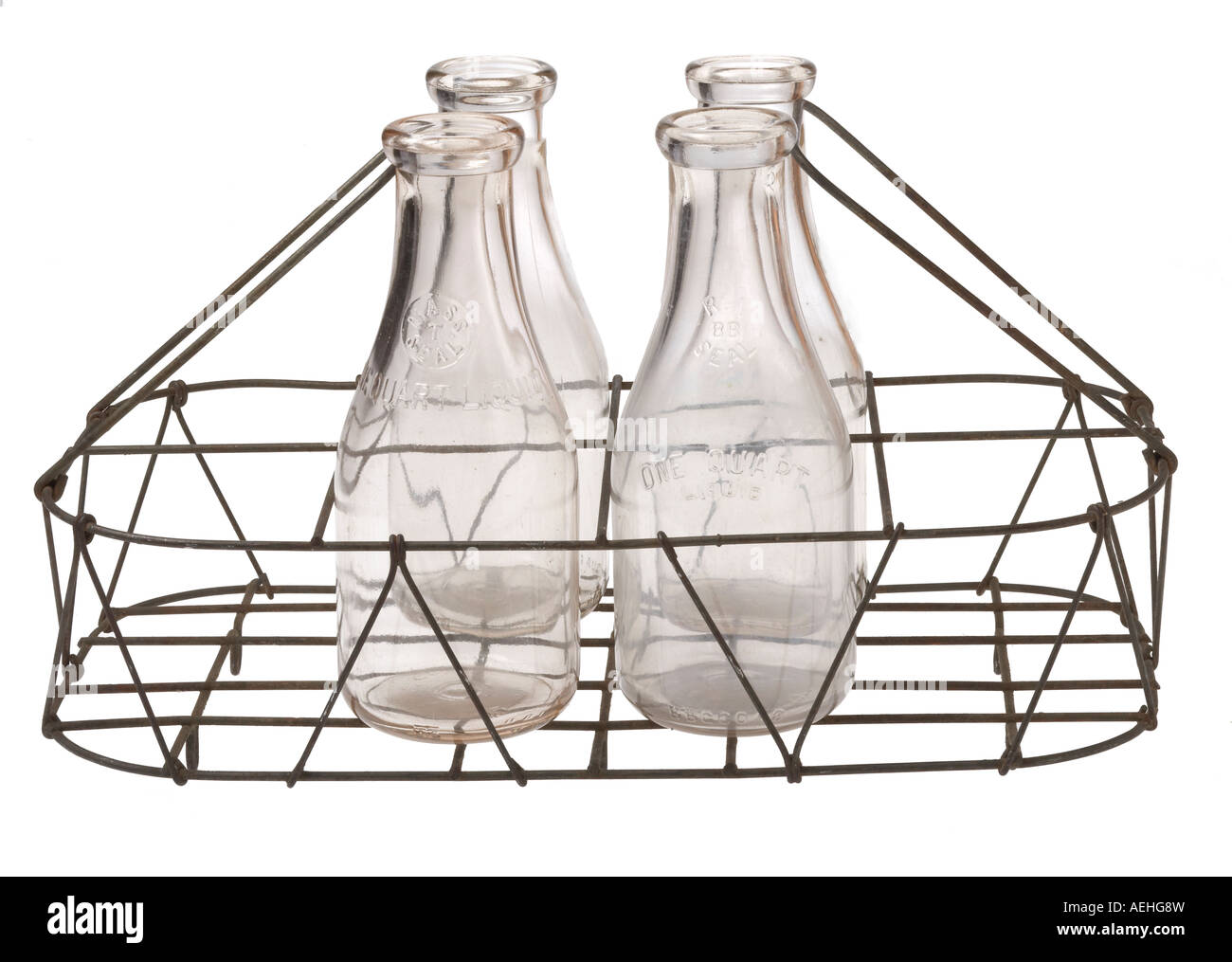 Milk Bottles in Wire Basket Stock Photo - Alamy