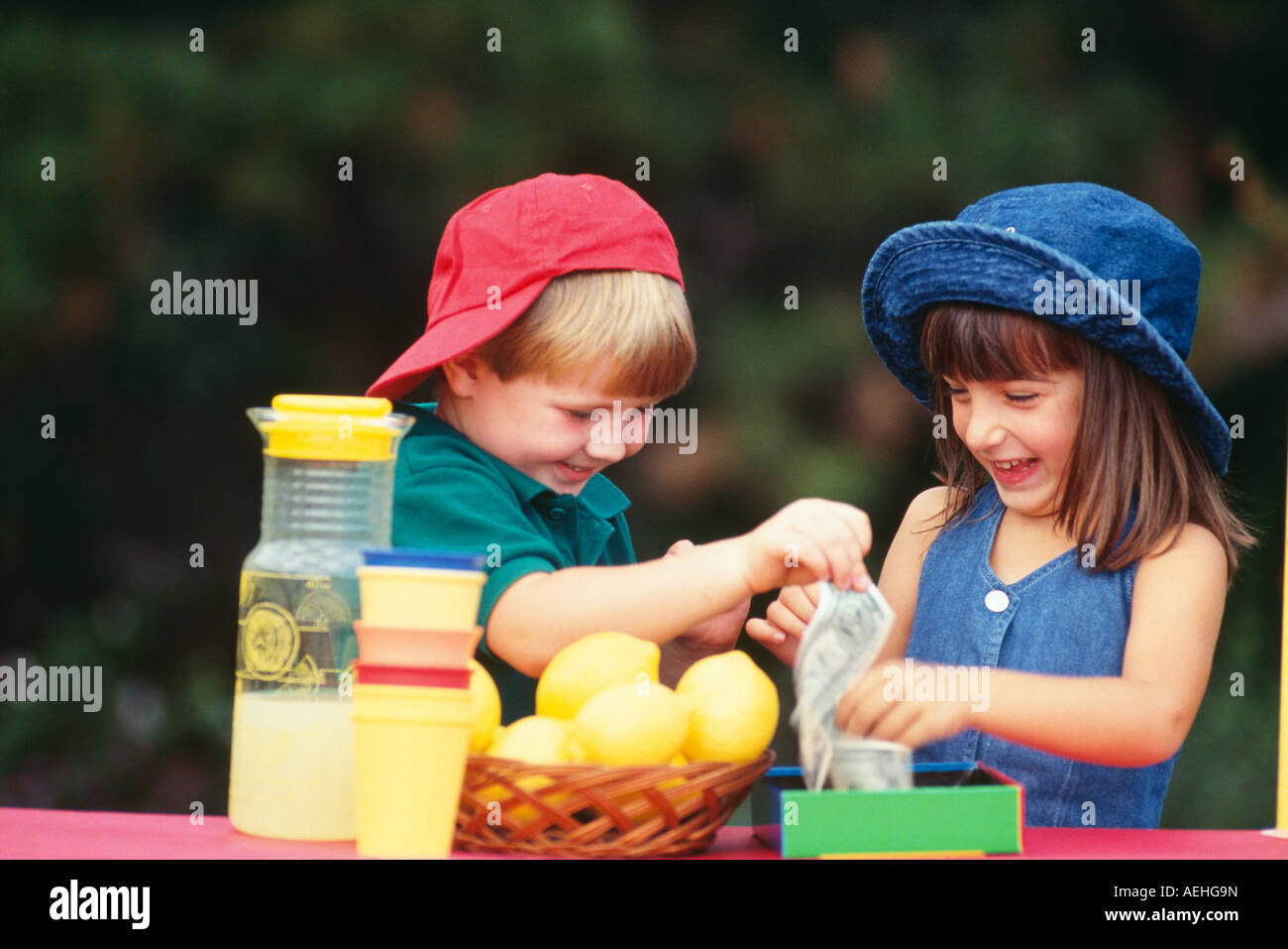 children-counting-money-in-stall-smiling-stock-photo-alamy