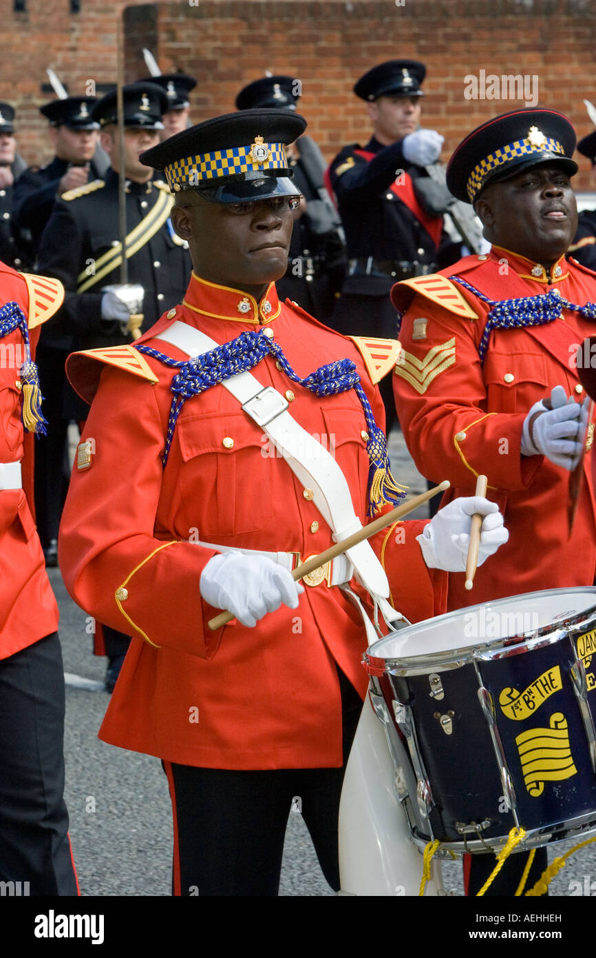 Member of Jamaican Defence Force JDF band playing drum as he marches ...