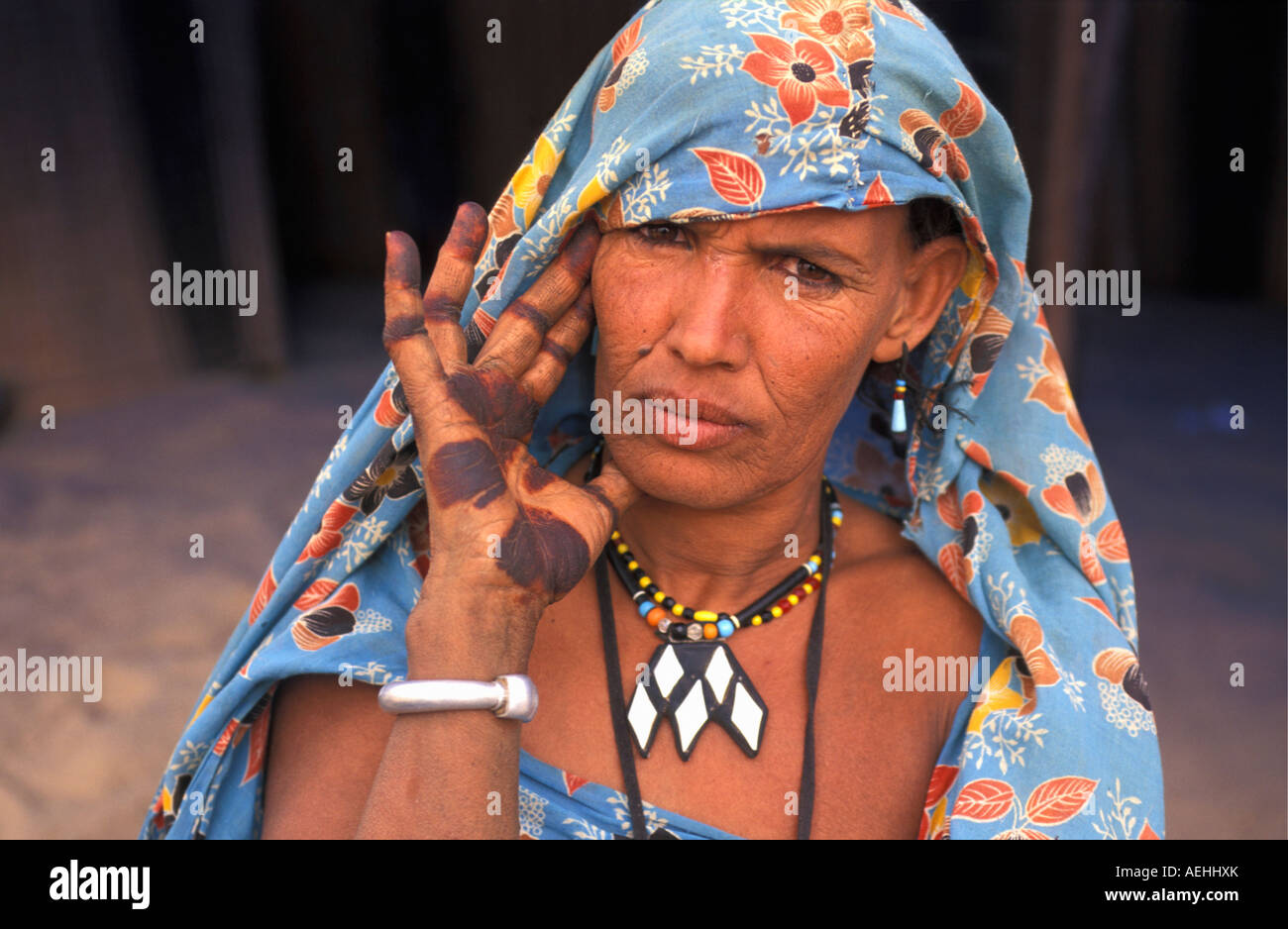 Mali Bamba, Mature woman of Tuareg tribe with henna on hands. Typical ...