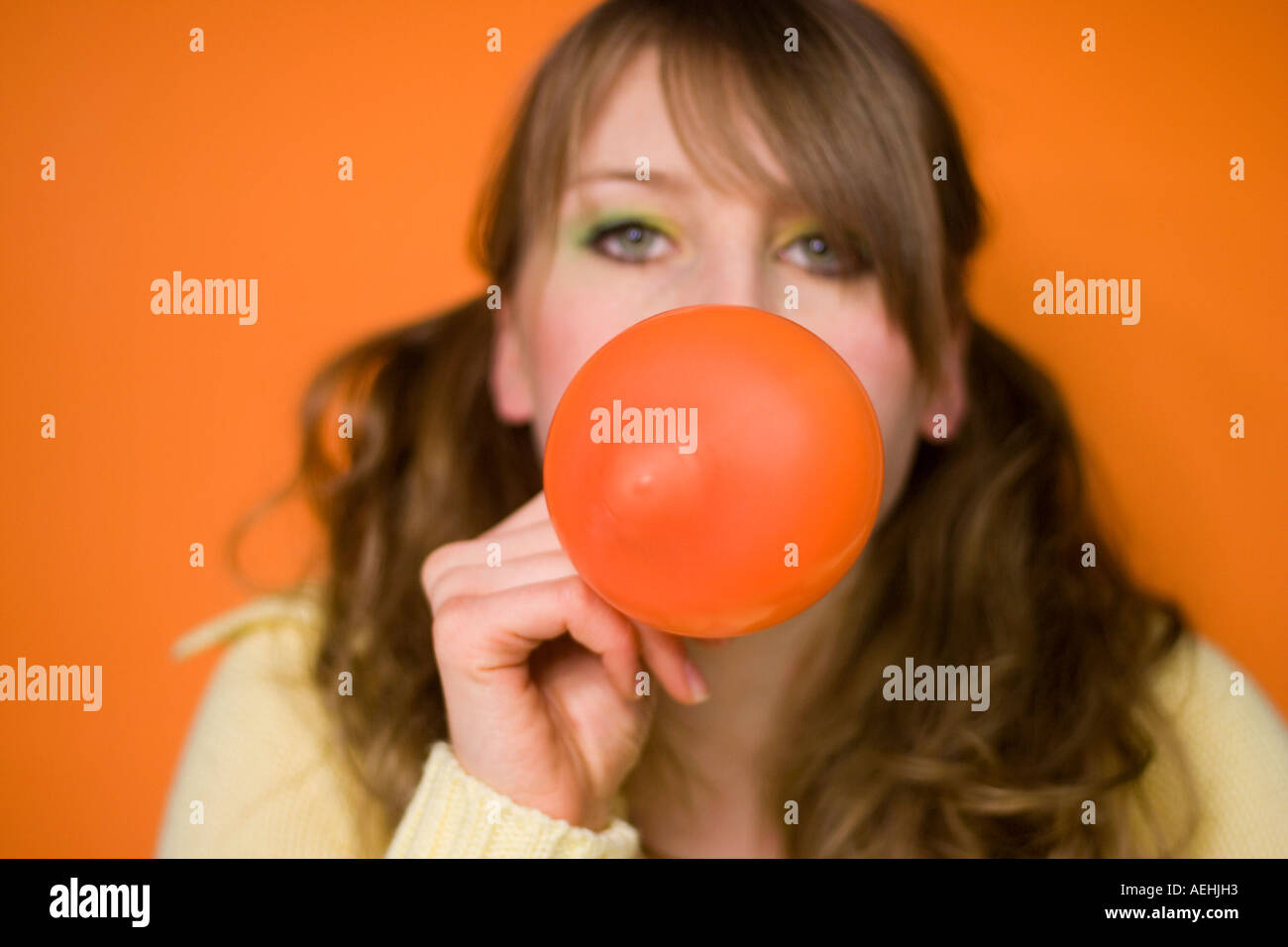 Blowing up balloons hi-res stock photography and images - Alamy