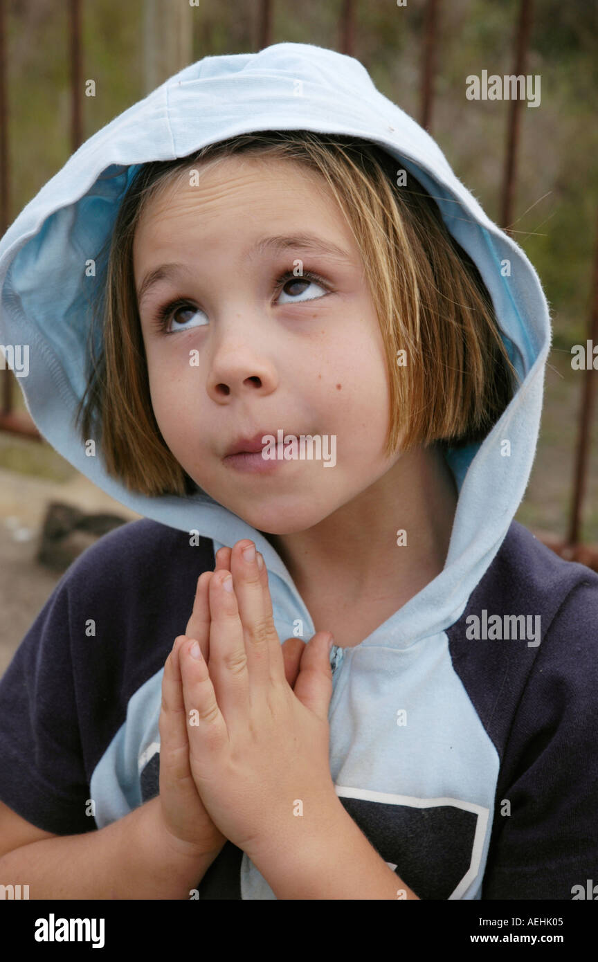 Praying hands over head hi-res stock photography and images - Alamy