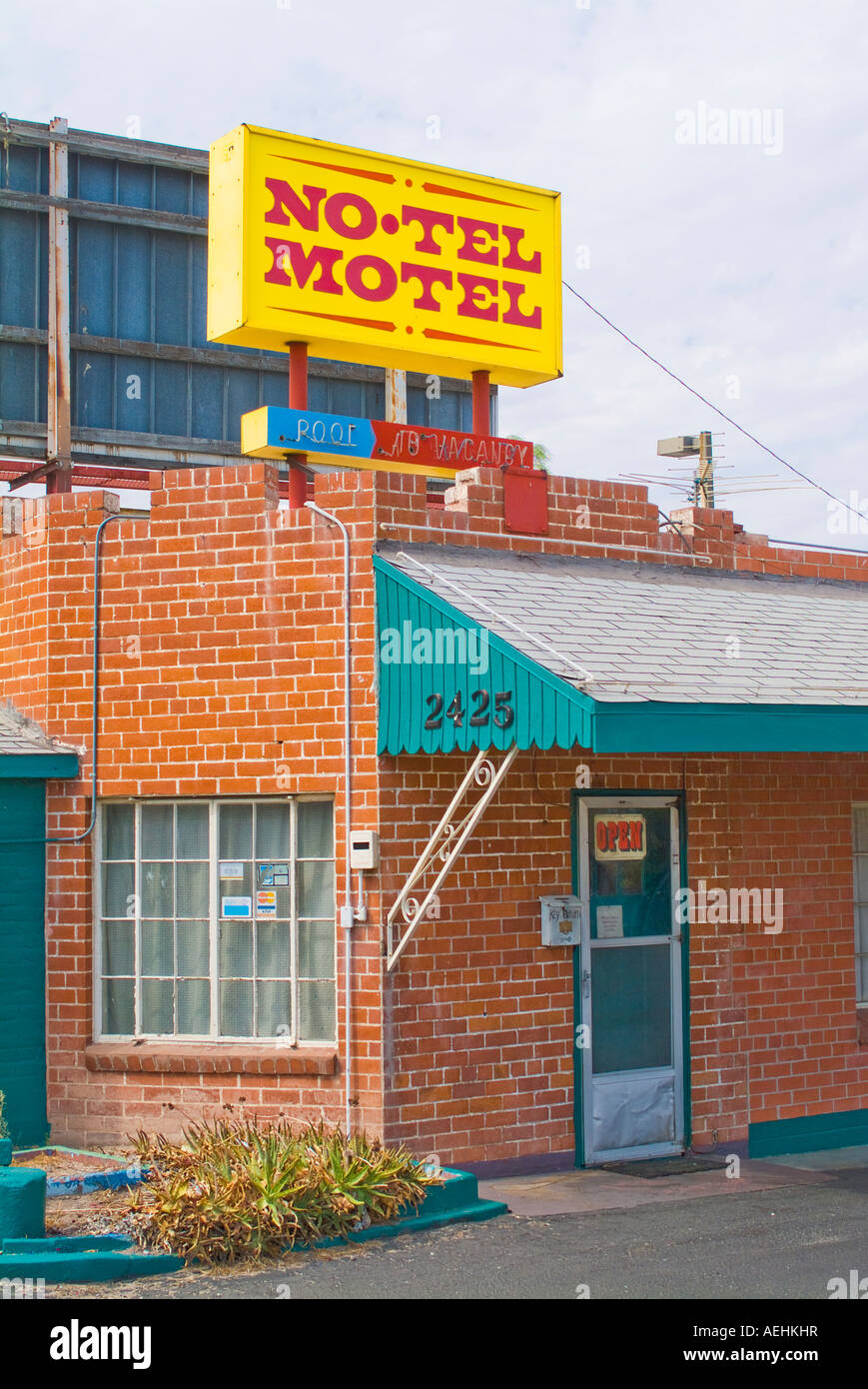 Tacky motel exterior that reads No Tell motel Stock Photo - Alamy