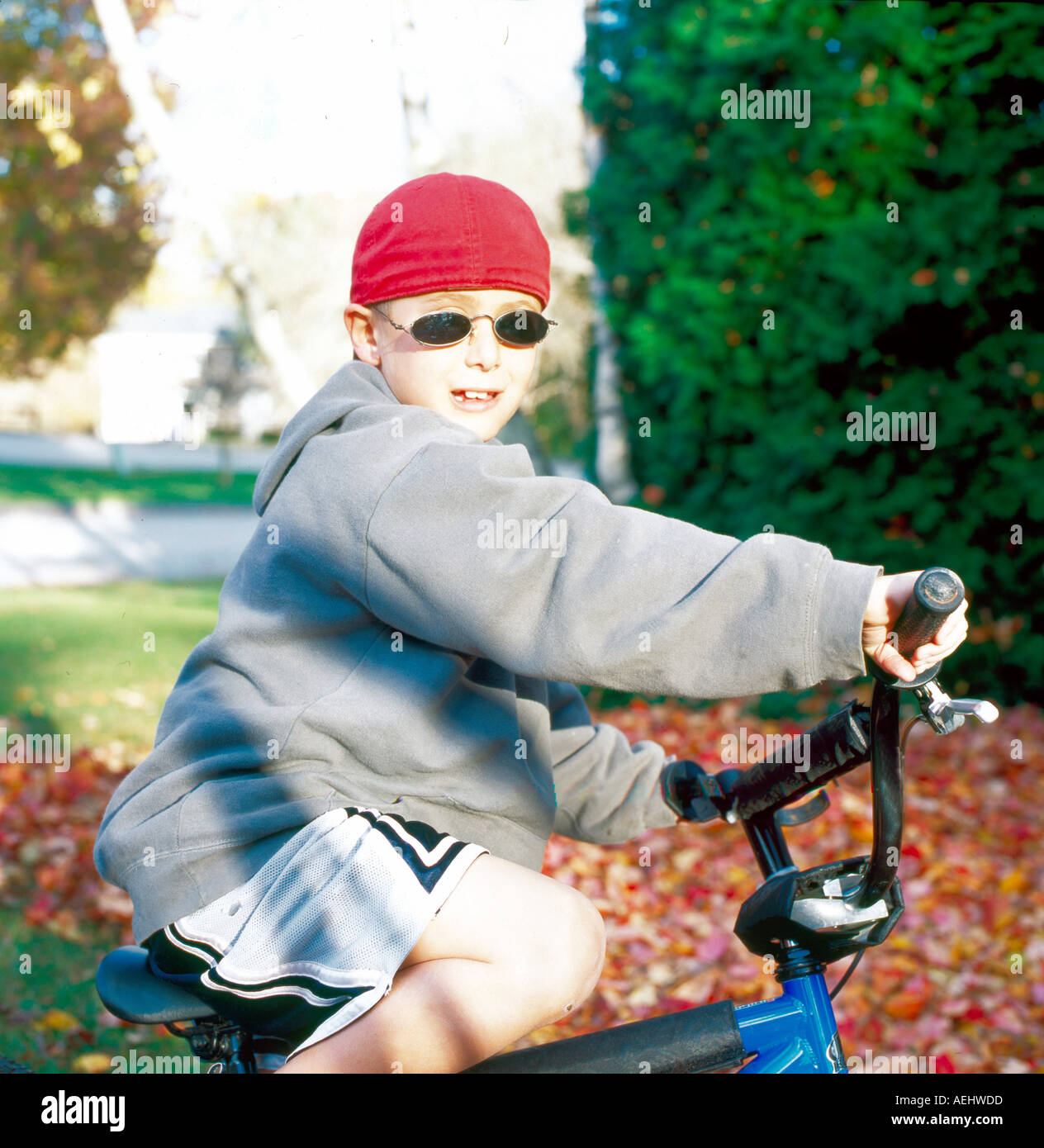Cool kid riding dirt bike Stock Photo - Alamy