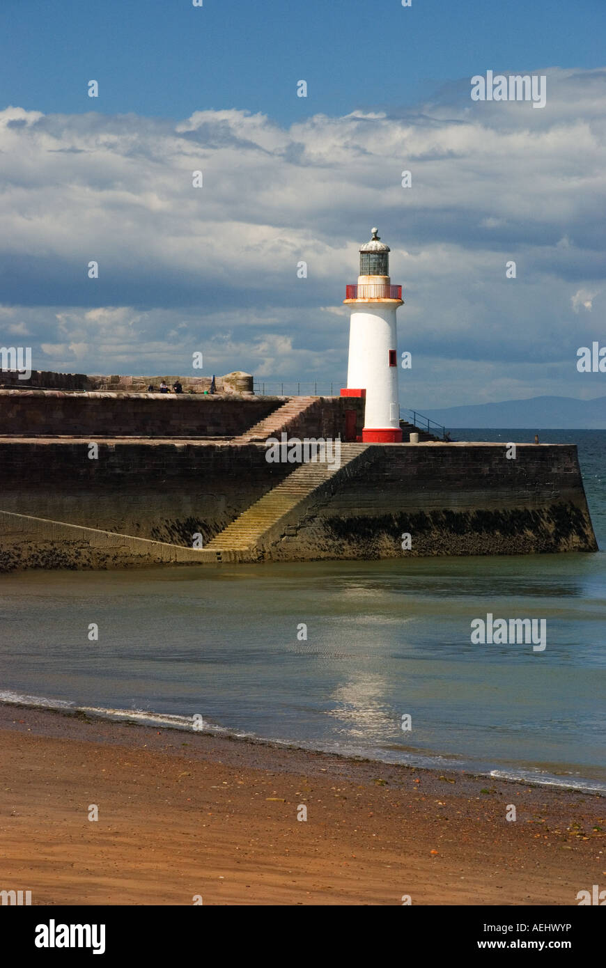 Lighthouse and harbour walls in Whitehaven, Cumbria, UK Stock Photo - Alamy