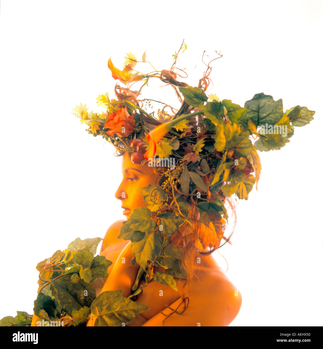 Profile of woman with flower arrangement on head Stock Photo - Alamy