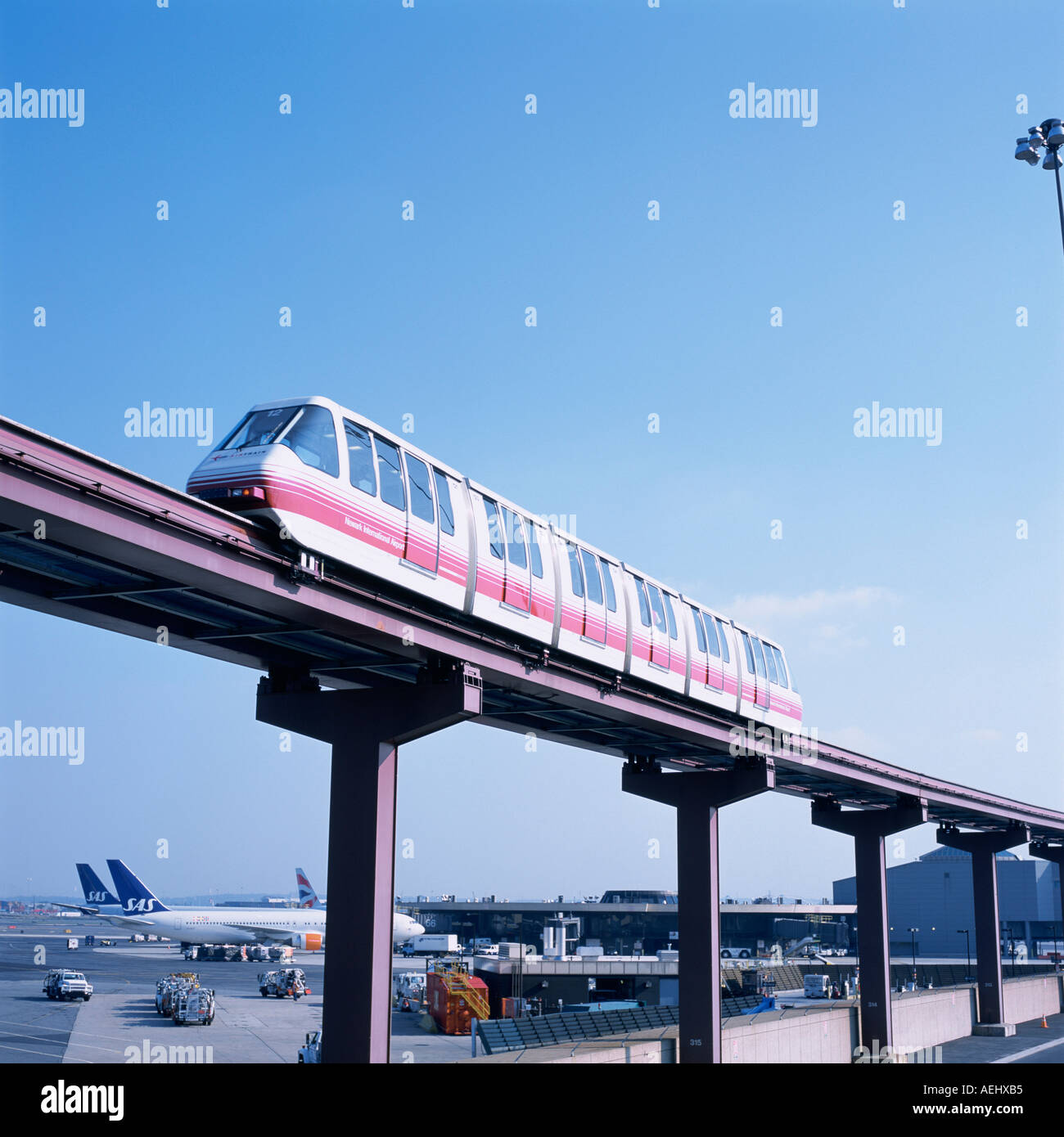 Overhead train at an airport Stock Photo - Alamy